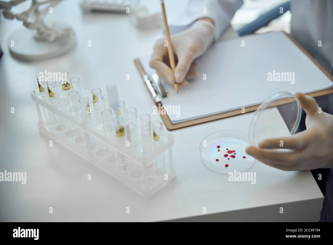 Experienced scientist working in a virology laboratory Stock Photo - Alamy