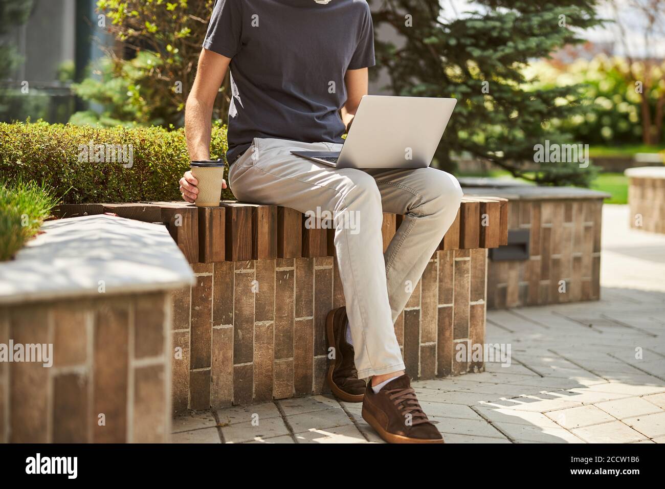 Young freelancer disposable coffee hi-res stock photography and images ...