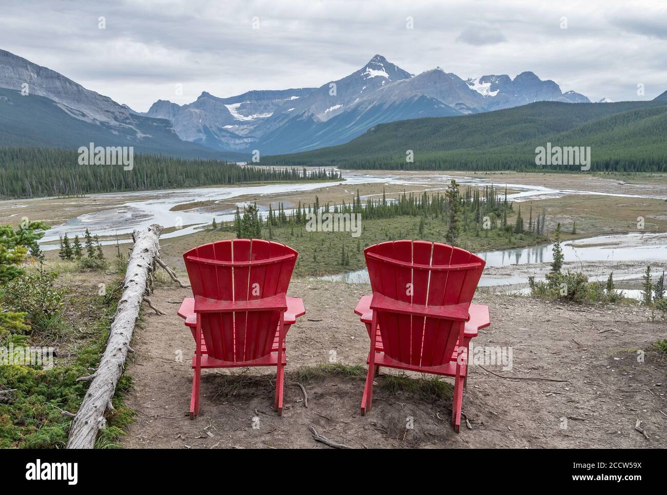 Red chairs at Howse River viewpoint in Banff National Park, Alberta ...