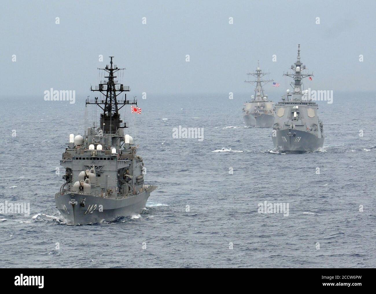 JMSDF Hiei underway with JMSDF Ashigara and USS Curtis Wilbur Stock ...