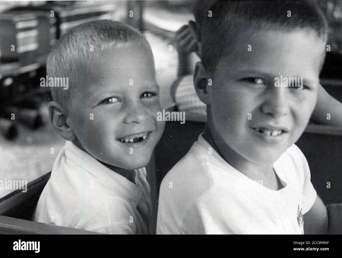 Jeb and Neil Bush on the train around the park at the Houston Zoo ...