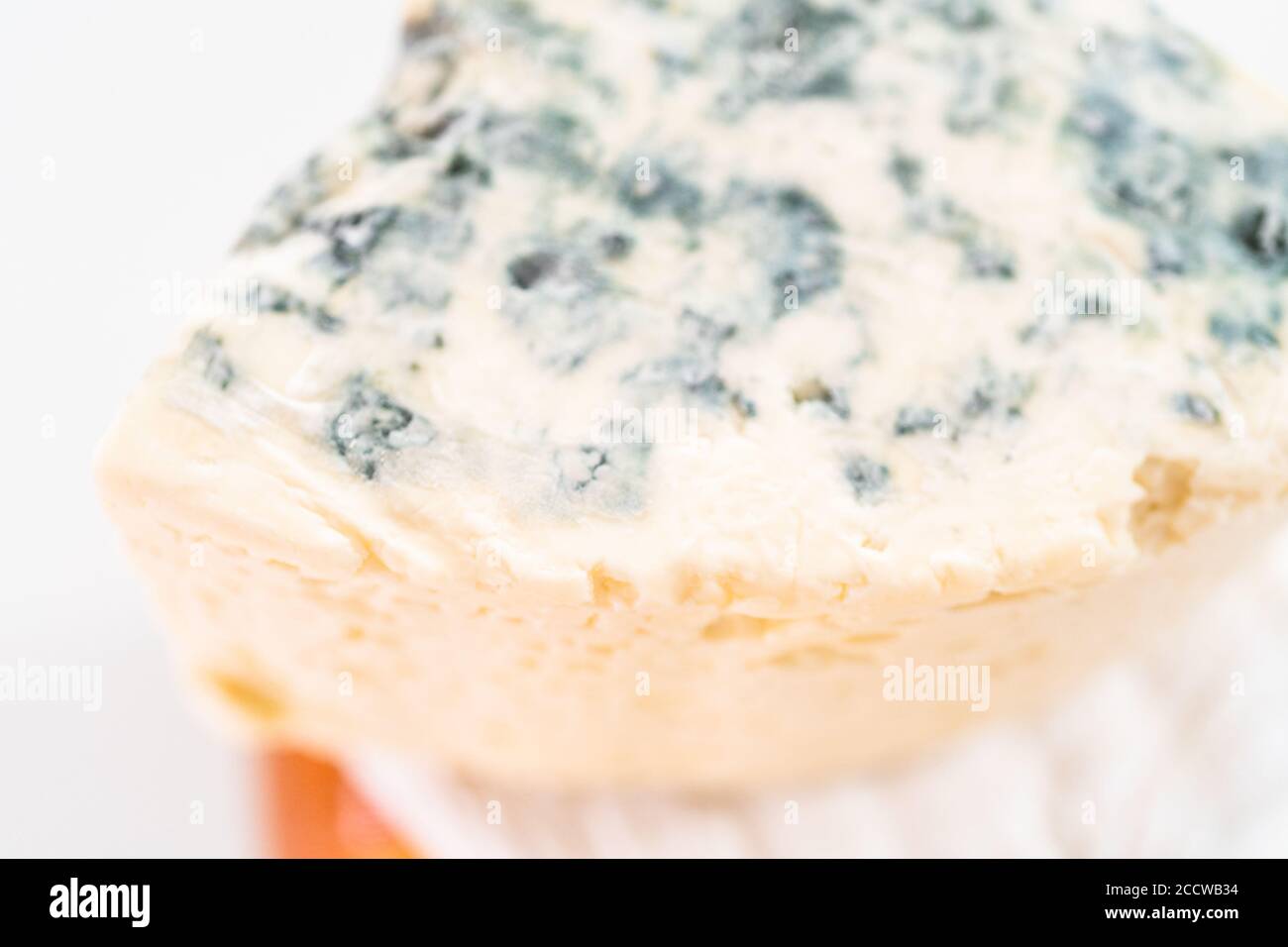 Variety of large wedges gourmet cheese on a white background Stock ...
