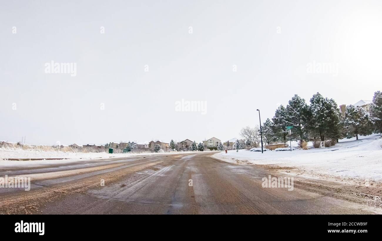 Driving on typical paved roads in a suburban upscale residential ...