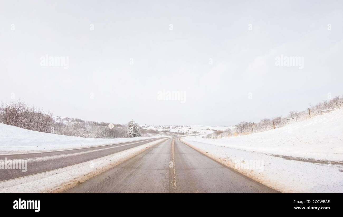 Driving on typical paved rural roads in suburban America Stock Photo ...