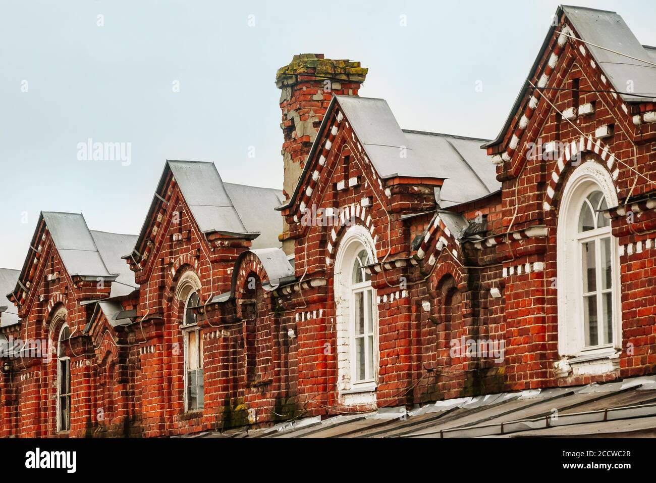 Roof of a beautiful old red brick building Stock Photo - Alamy