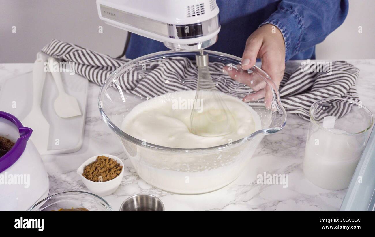 Step by step. Preparing homemade chocolate ice cream in a hand kitchen ...