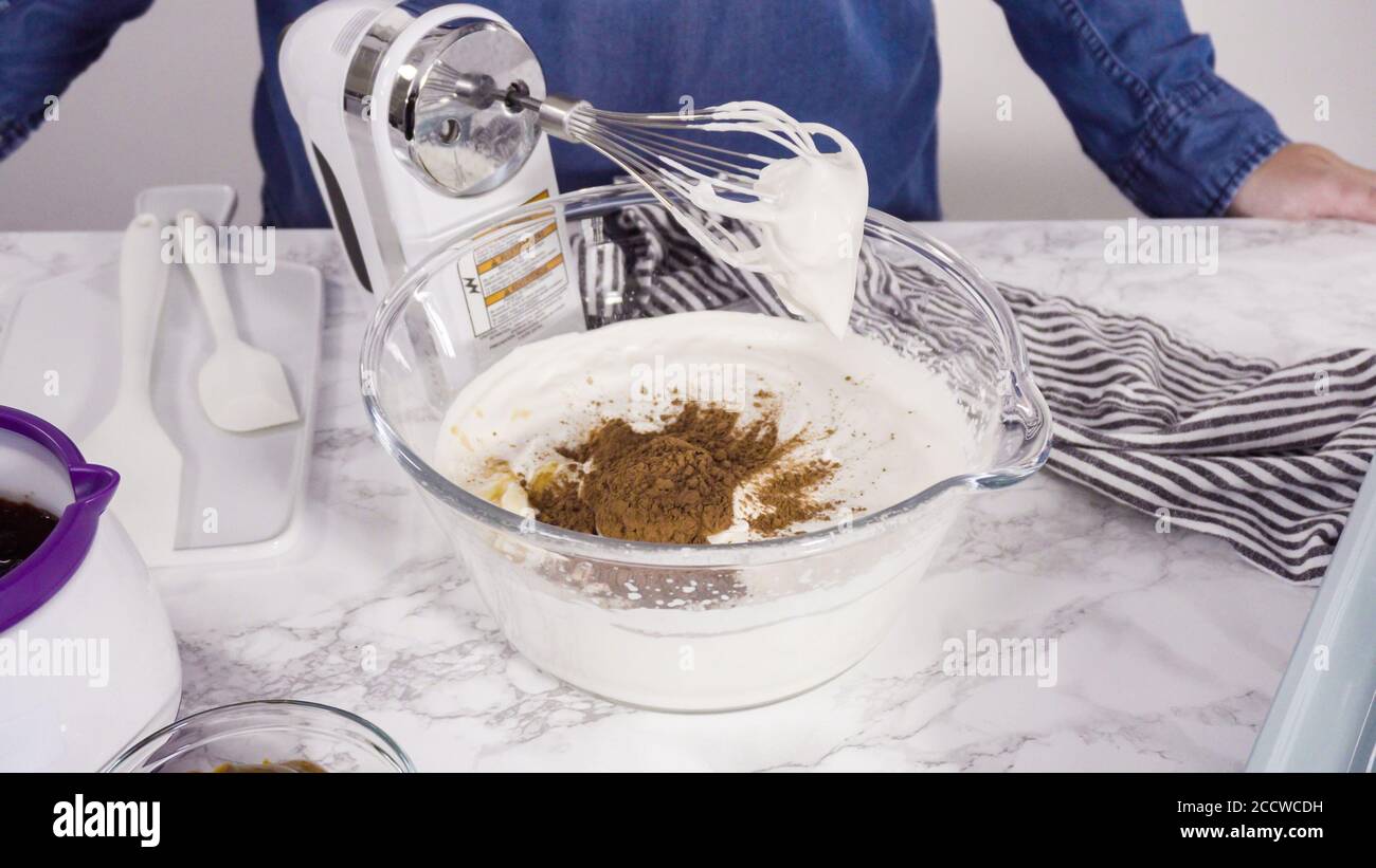 Step by step. Preparing homemade chocolate ice cream in a hand kitchen ...