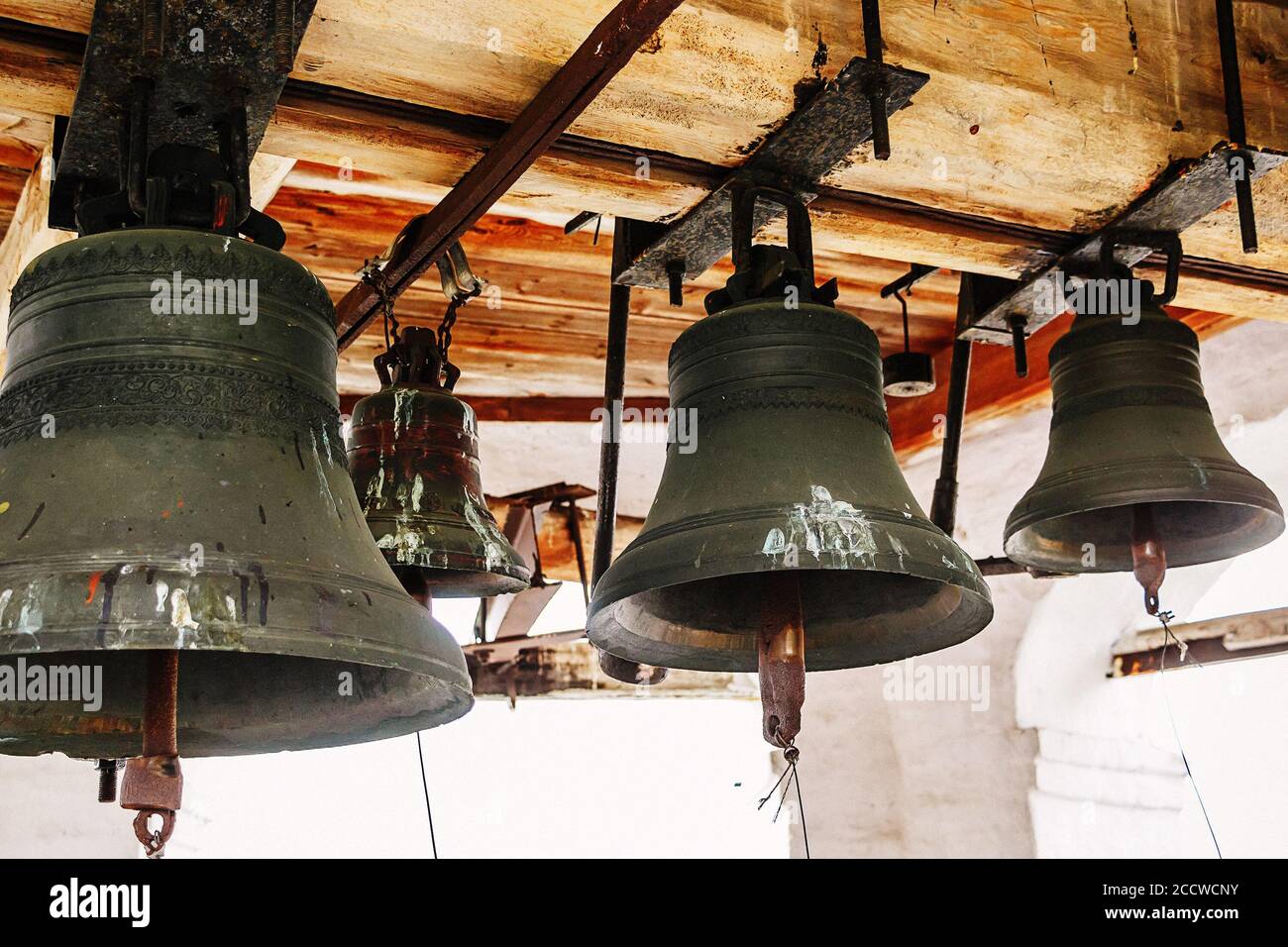 Old bells on a church tower. Religious symbol Stock Photo - Alamy