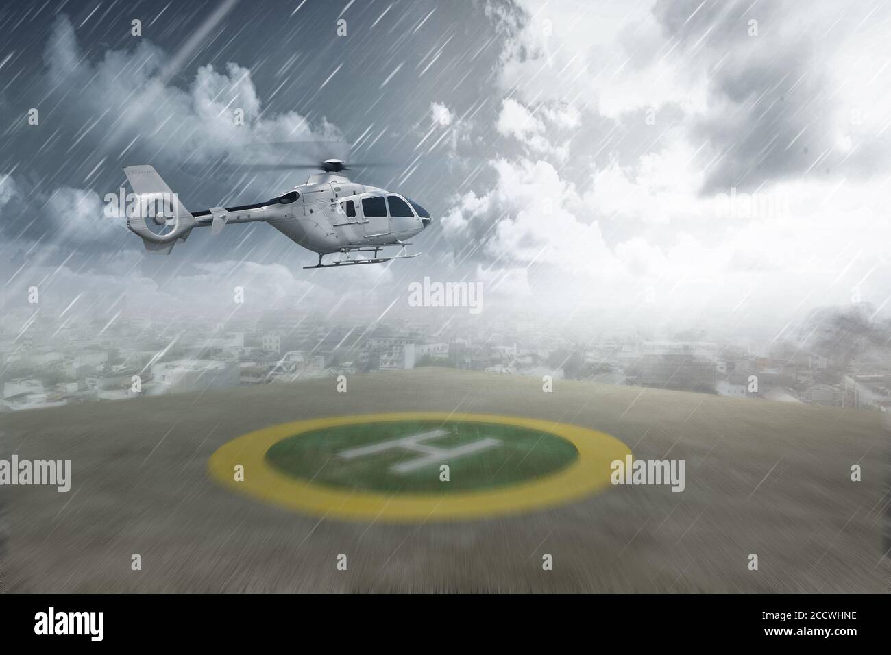 The helicopter takes off from the helipad with rainy weather Stock ...