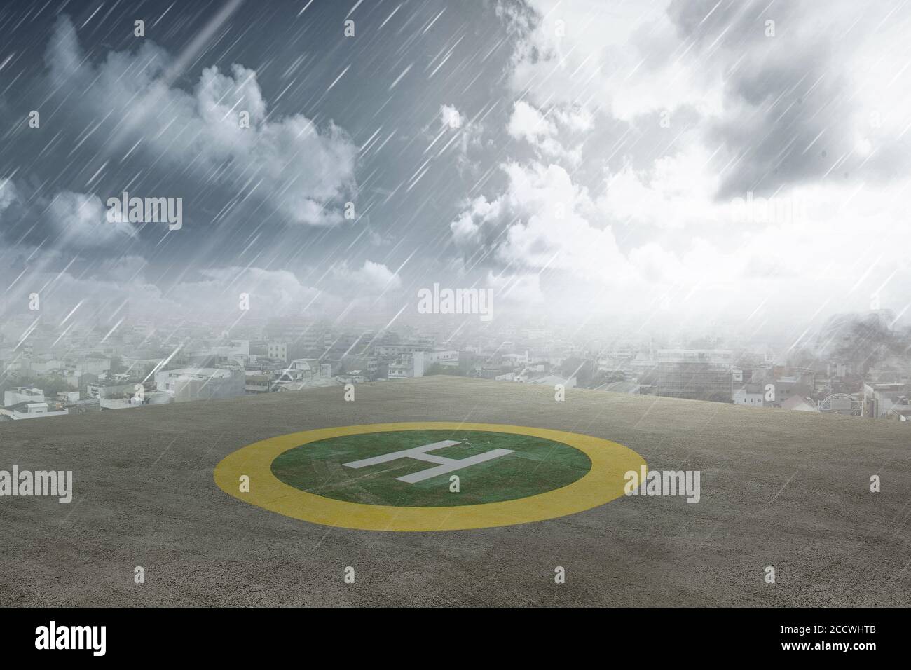 The helipad in the rooftop of the building with cityscapes background ...