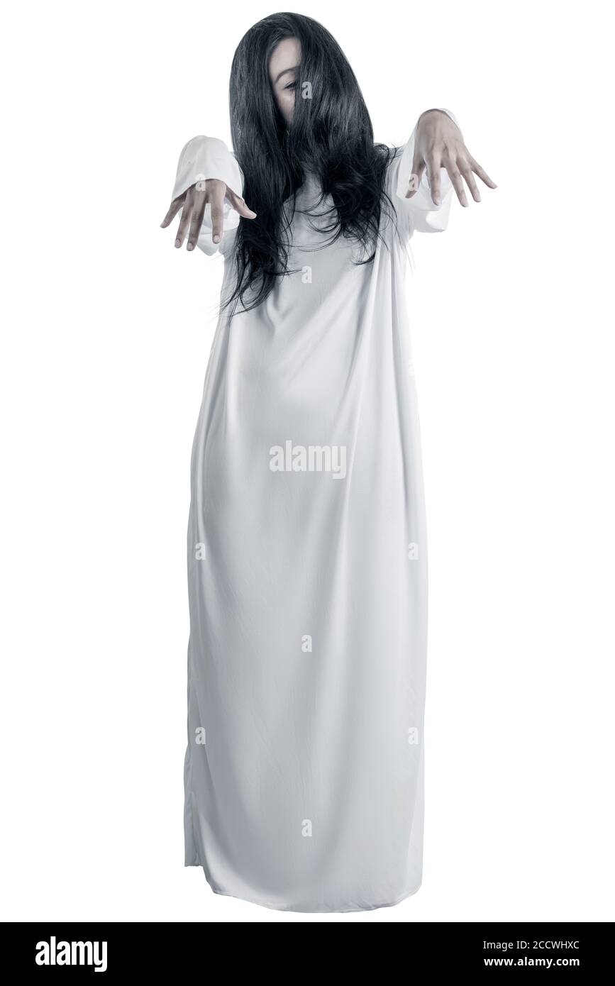 Scary ghost woman standing isolated over white background. Halloween ...