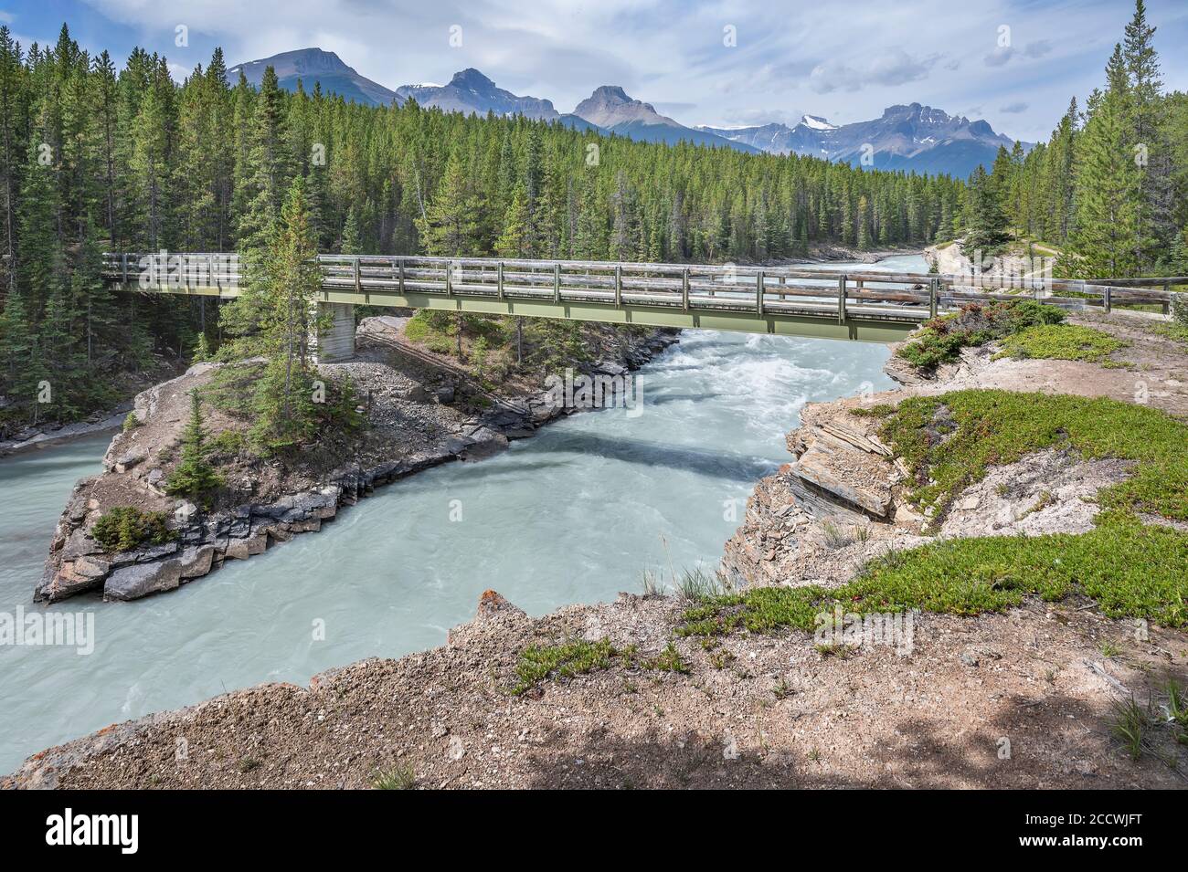 Pedestrian bridge over the North Saskatchewan River in Banff National ...