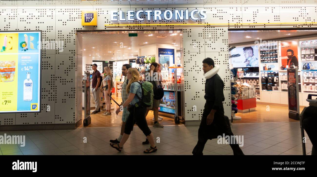Schiphol Airport with an electronic shop for travelers. Amsterdam ...