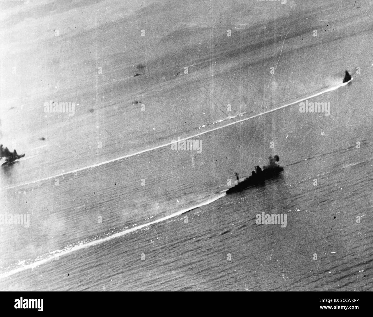 Japanese light cruiser under attack during the Battle of Sibuyan Sea ...