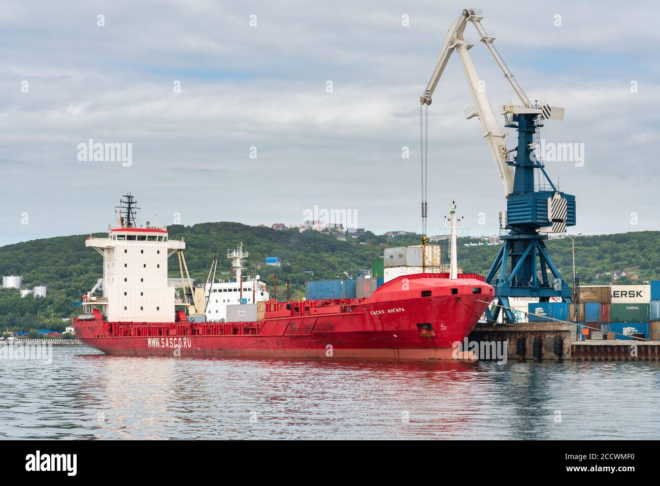 Portal crane unloading cargo container ship Sasco Angara Russian ...