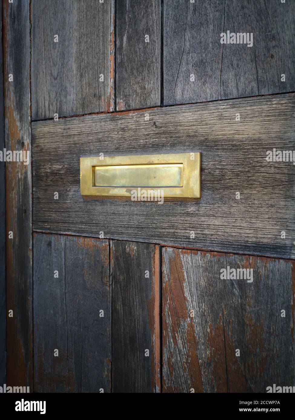 mailbox in an old door Stock Photo - Alamy