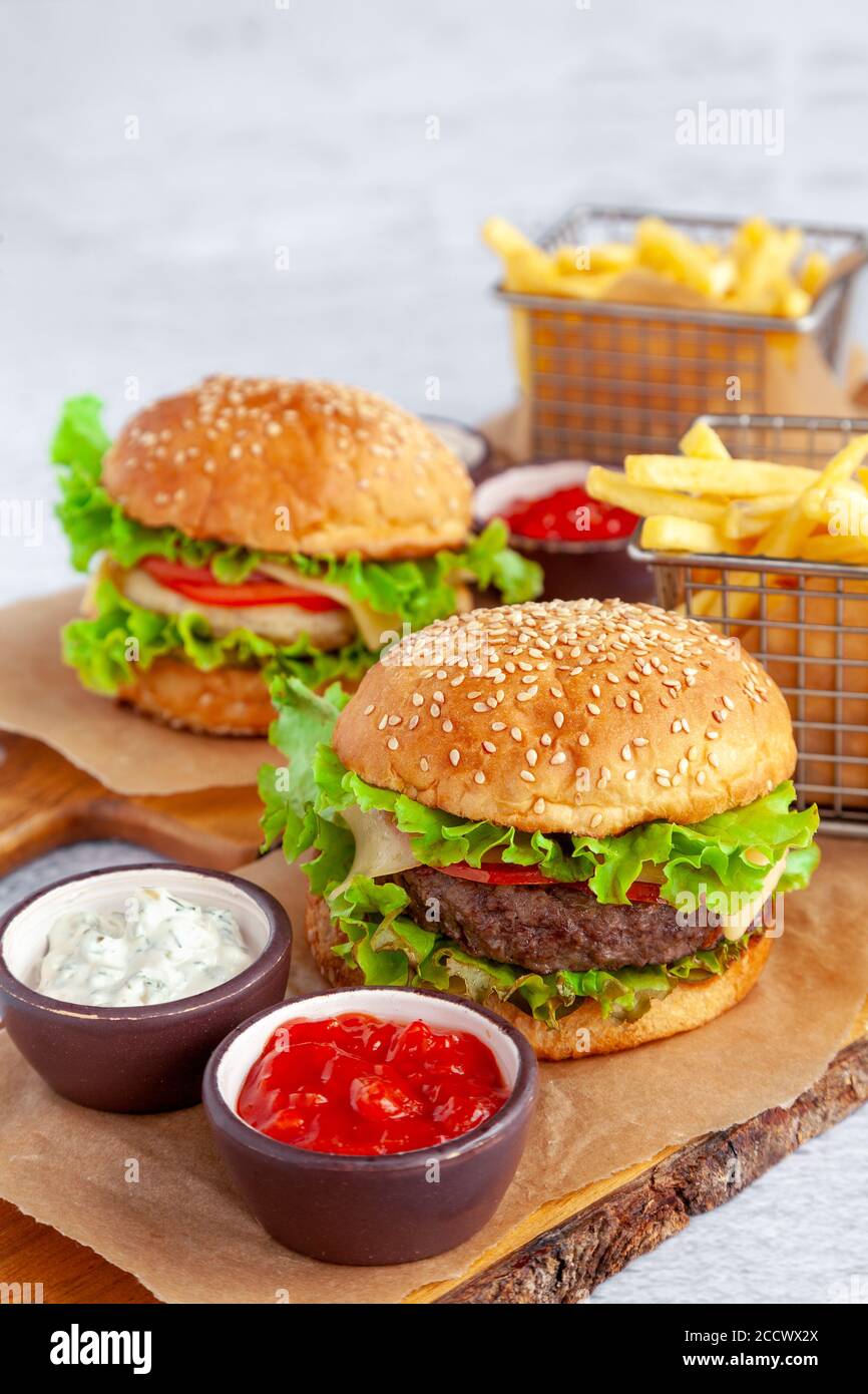 American beef burger with french fries, bun, beef cutlet, cheese Stock ...