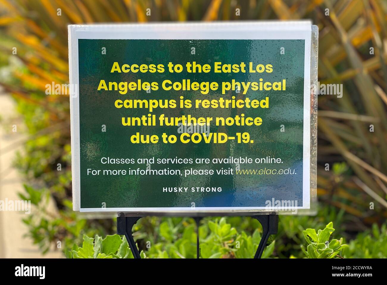 A closed campus sign at East Los Angeles College amid the global ...