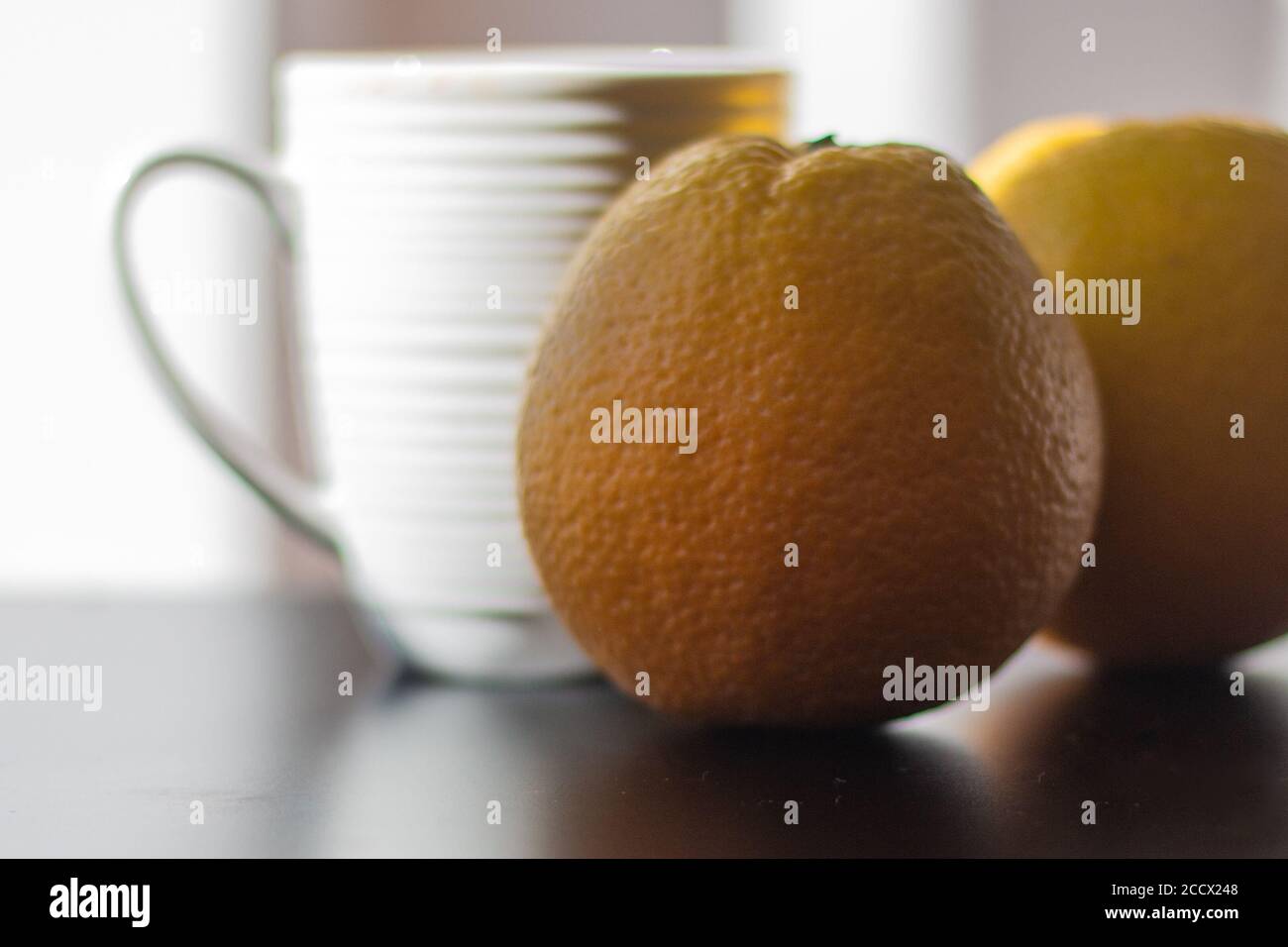 Fresh orange on the table. Healthy fruit for breakfast with a tasty ...