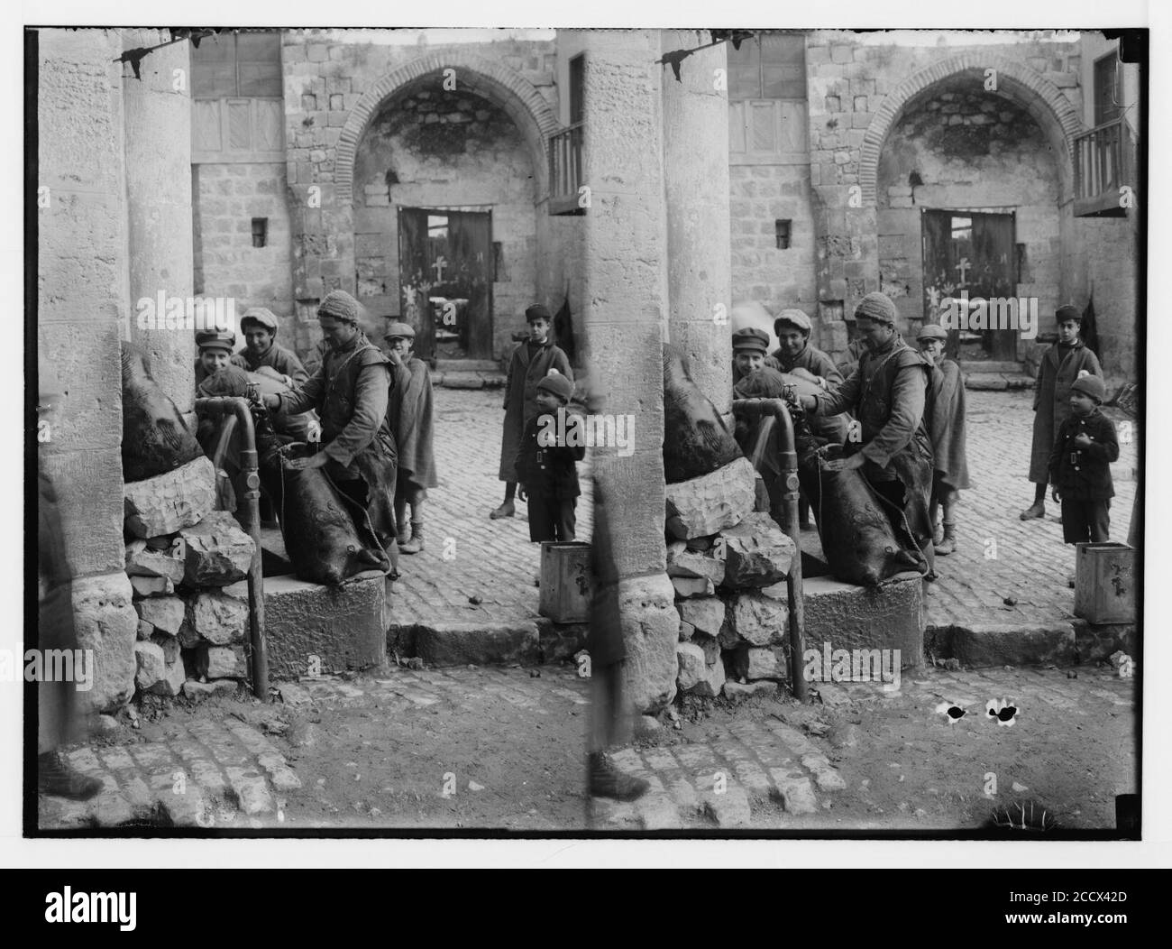 Jerusalem water works. Filling waterskins at Damascus Gate Stock Photo ...