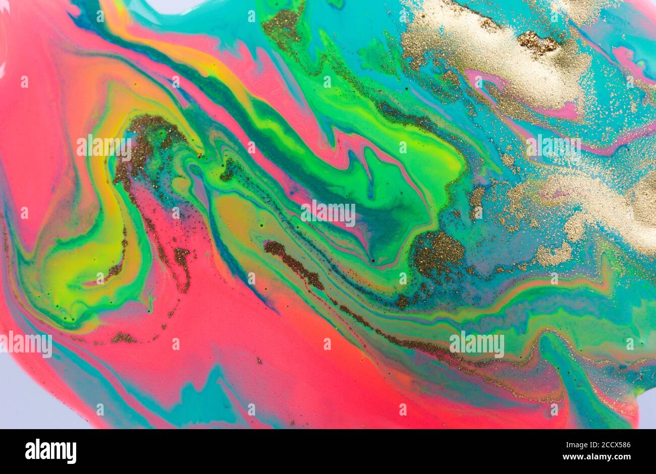 Neon colored marble pattern with golden glitter. Fluorescent liquid ...