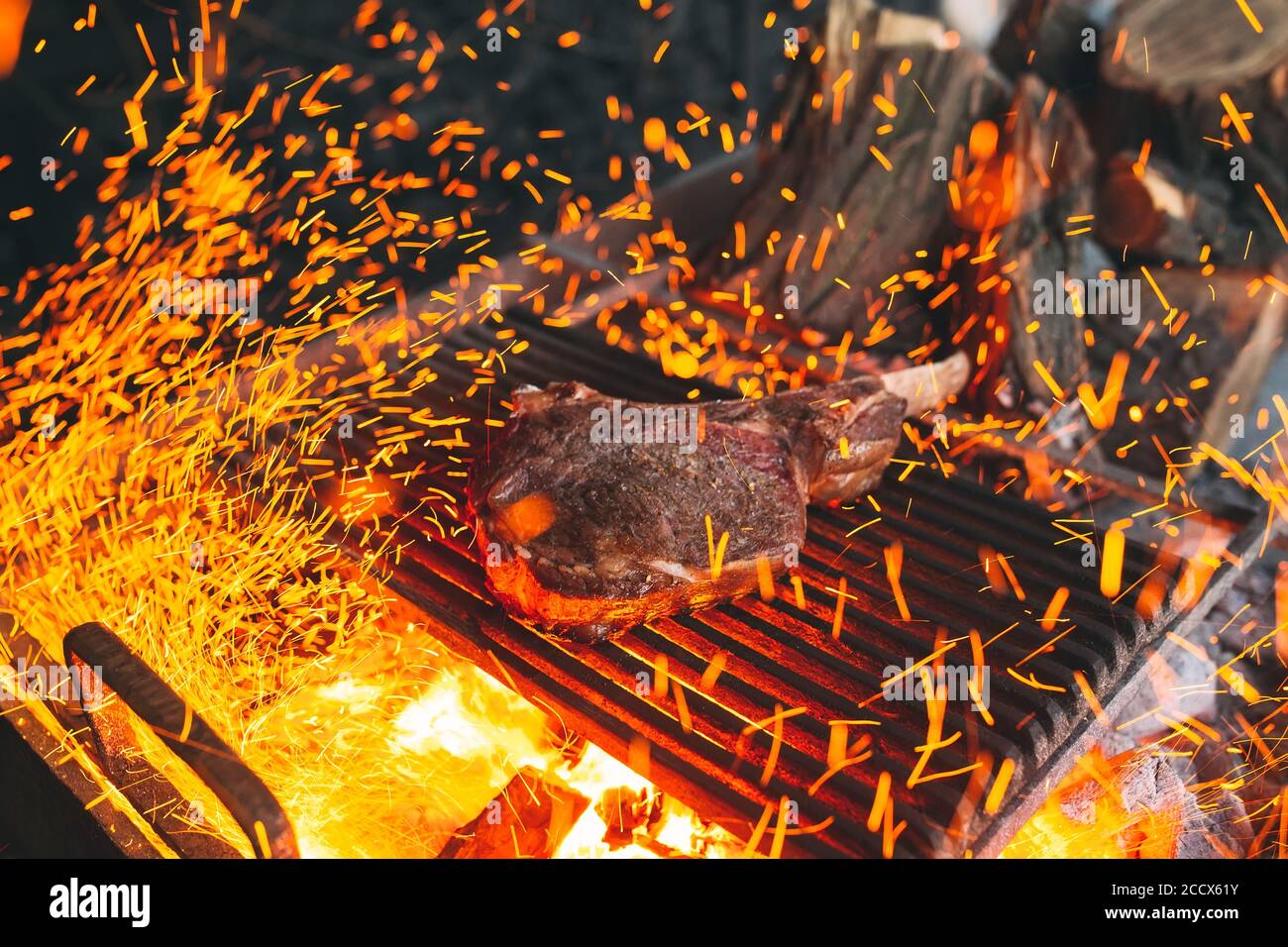 Beef steak is cooked on fire. Beef Rib BBQ Stock Photo - Alamy