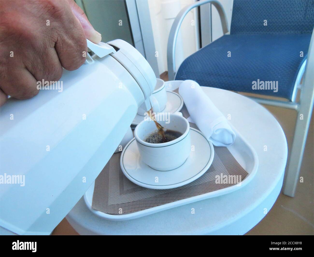 Cup of coffee on a cruise ship balcony Stock Photo - Alamy