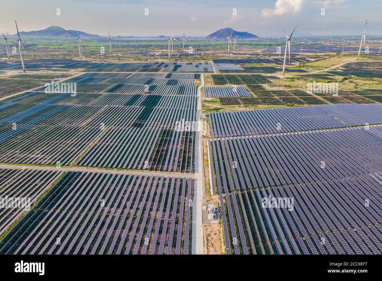 solar energy panels and wind turbine. Drone view Stock Photo - Alamy