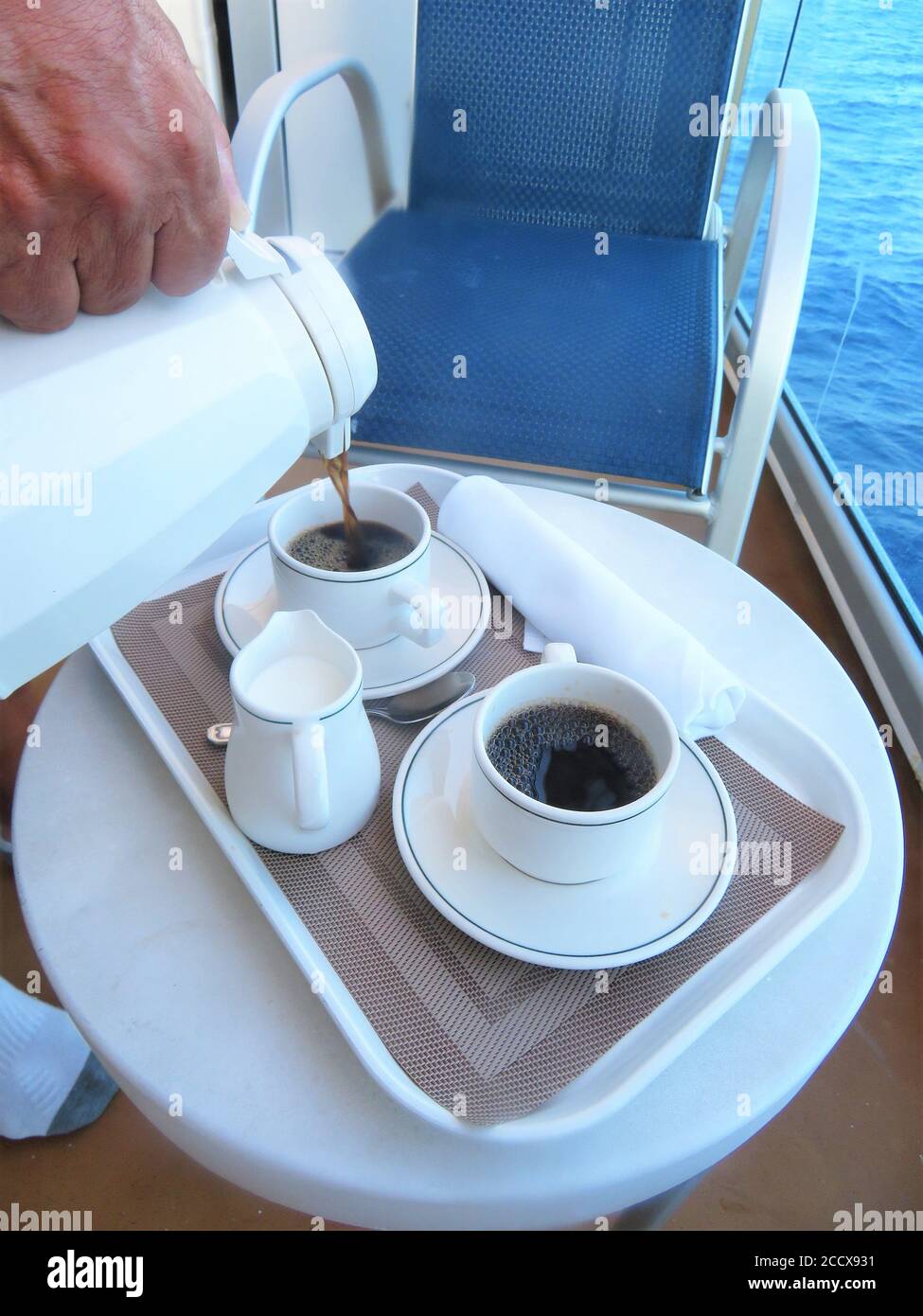 Cup of coffee on a cruise ship balcony Stock Photo - Alamy
