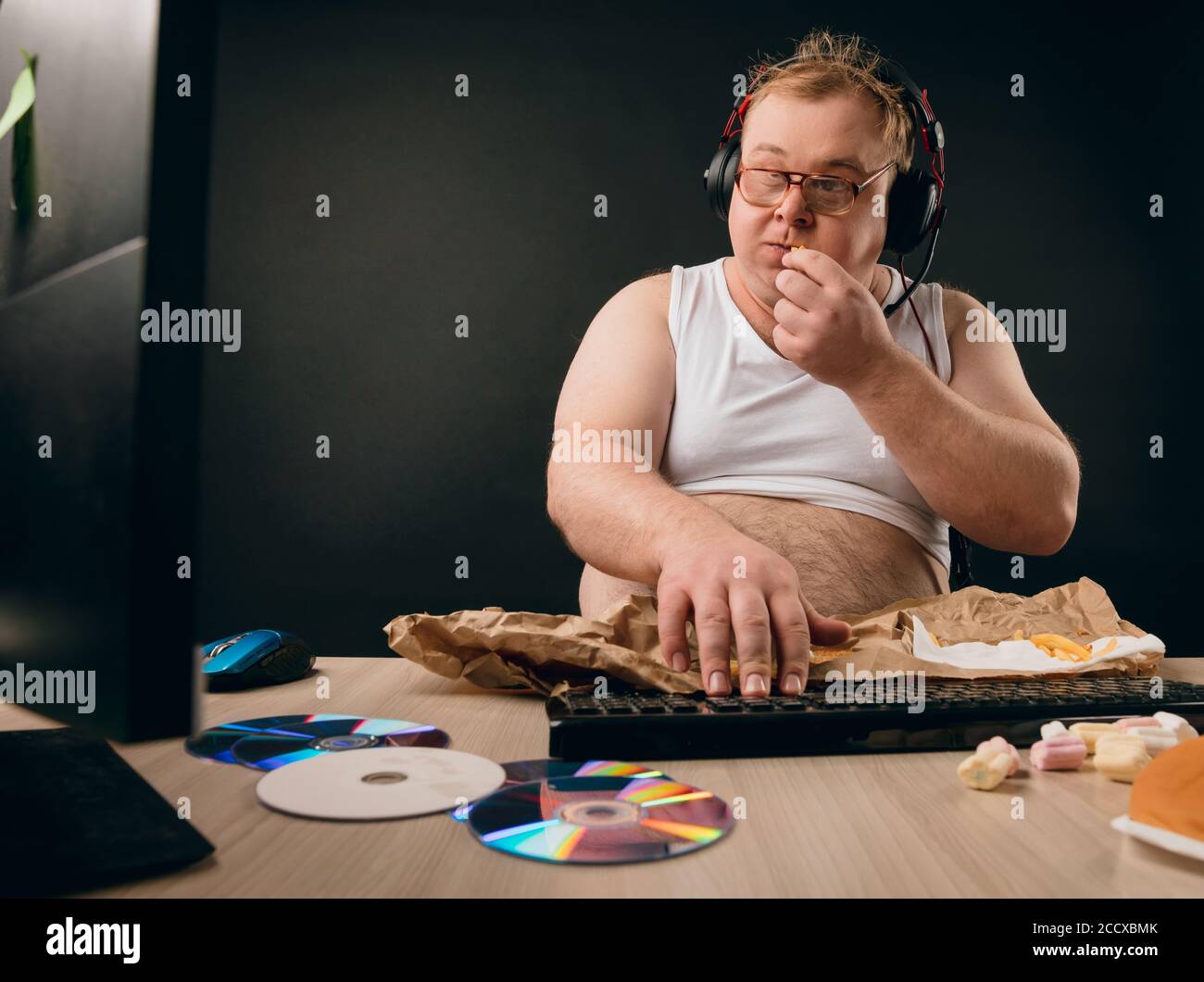 lazy man watching his favourite movie. close up photo. isolated black ...