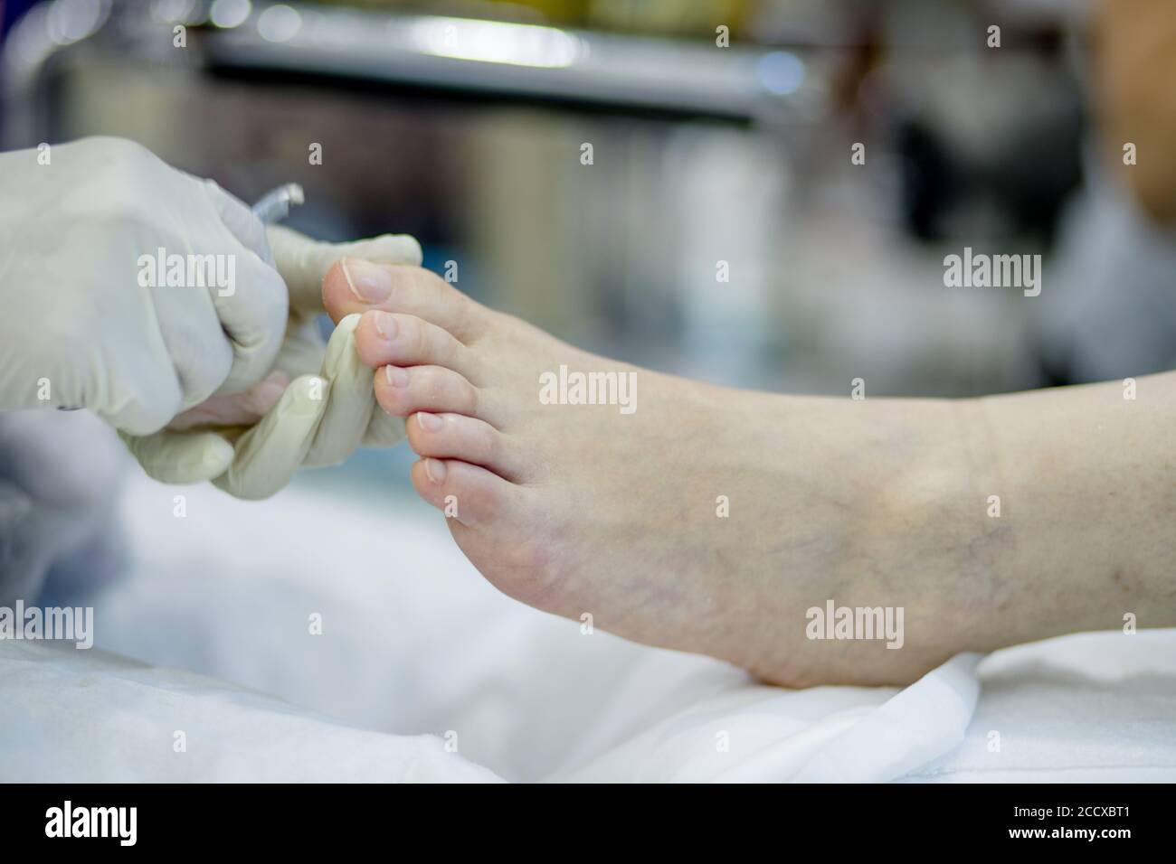 female getting foot treatment in saloon ,spa Stock Photo - Alamy