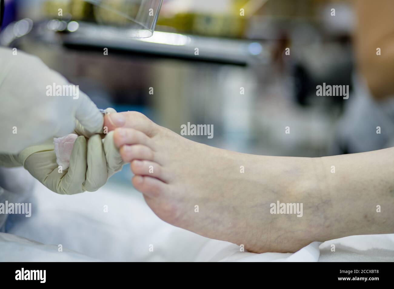 female getting foot treatment in saloon ,spa Stock Photo - Alamy