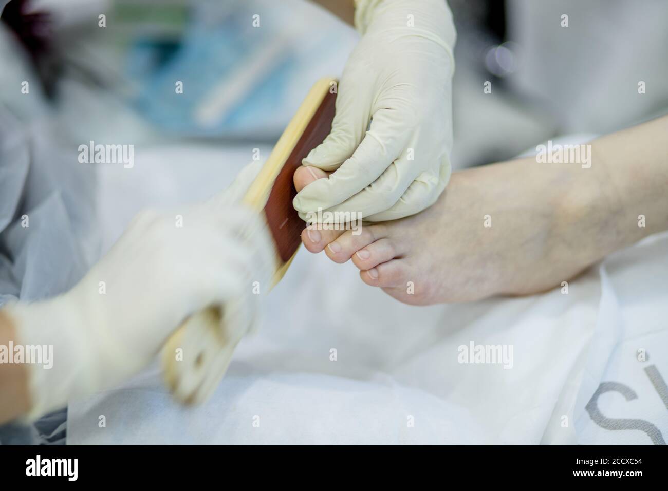 Woman feet getting a foot massage hi-res stock photography and images ...