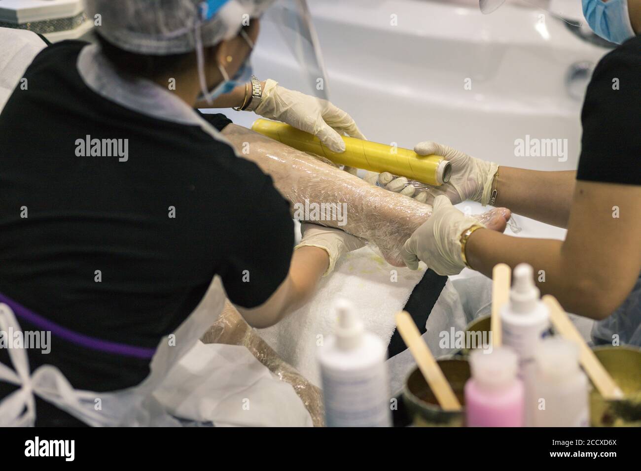 female getting foot treatment in saloon ,spa Stock Photo - Alamy