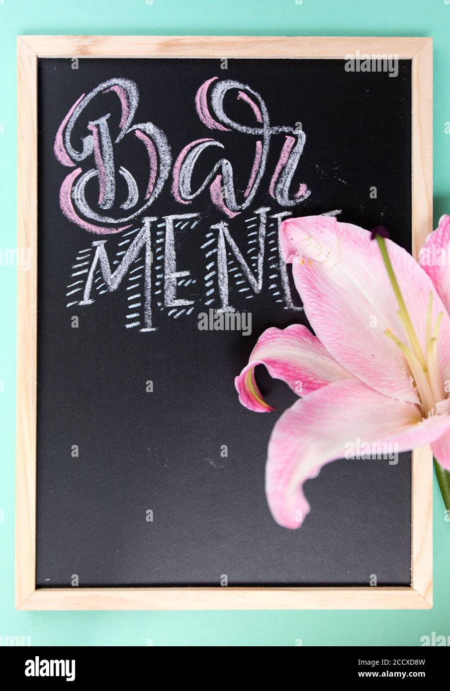 Blank blackboard with wooden frame and chalk inscription. Bar menu ...