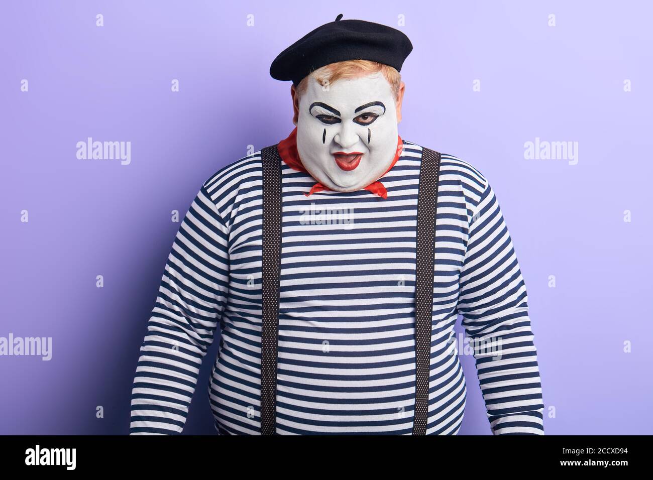 Angry aggressive plump comedy man looking at the camera seriously ...