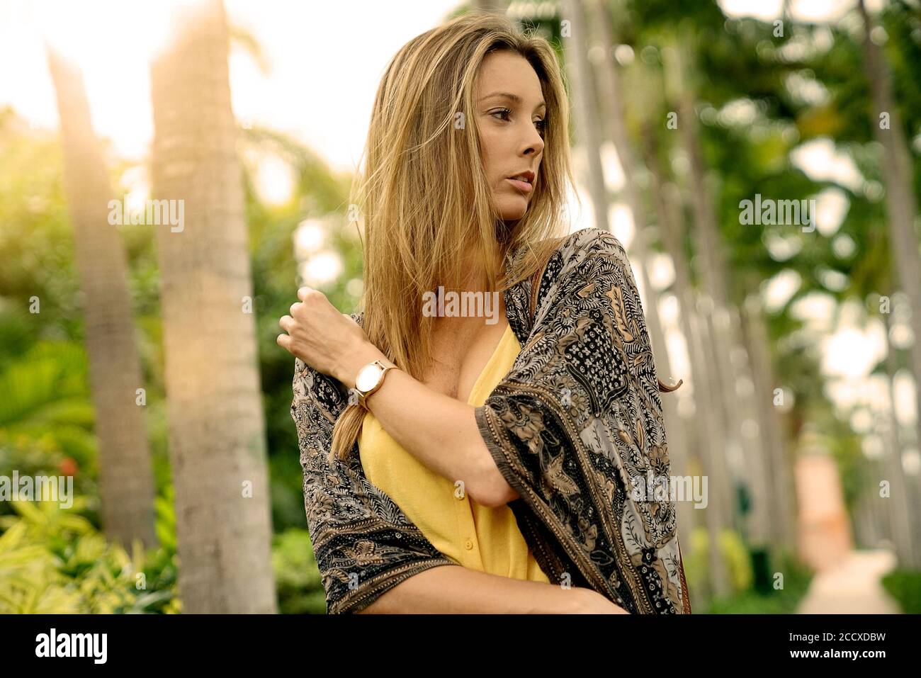 Beautiful bohemian woman posing in exotic setting Stock Photo - Alamy
