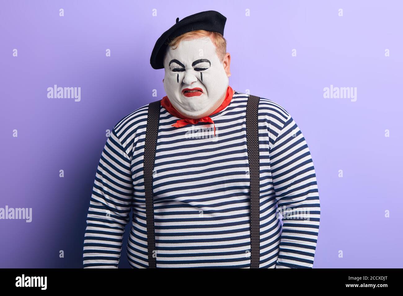 crying mime wearing striped sweater, beret. close up photo. negative ...