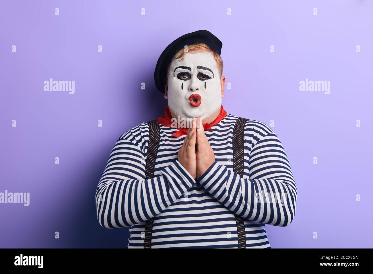 emotional sad unhappy artist keeps palms under chin, asking to help him ...