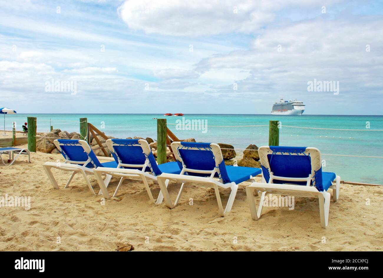 Lounge chairs on the beach Stock Photo - Alamy