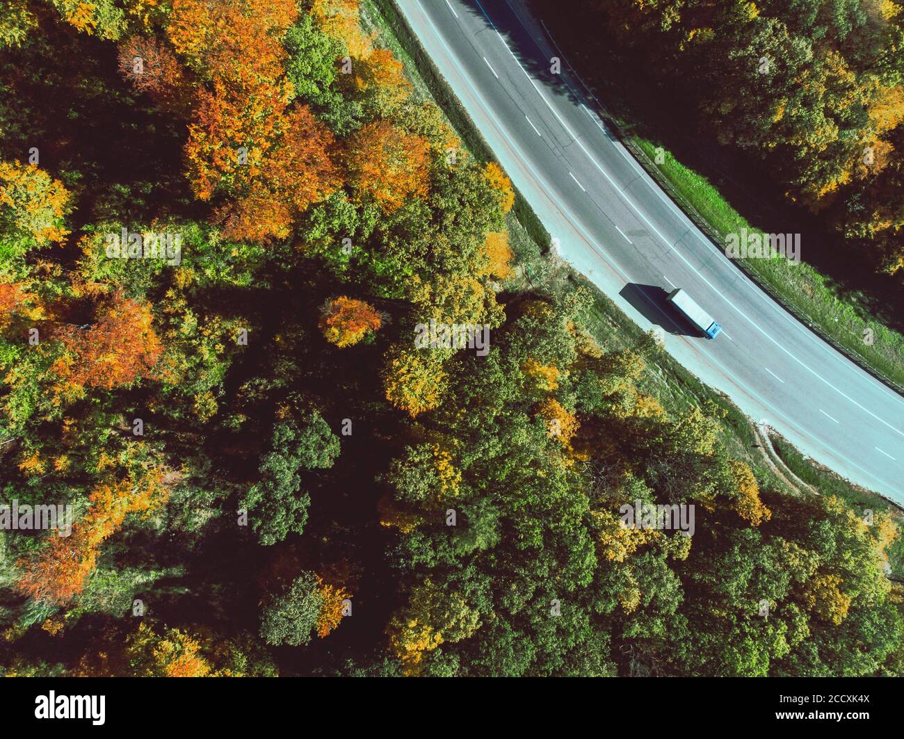 aerial view of autumn highway in forest Stock Photo - Alamy