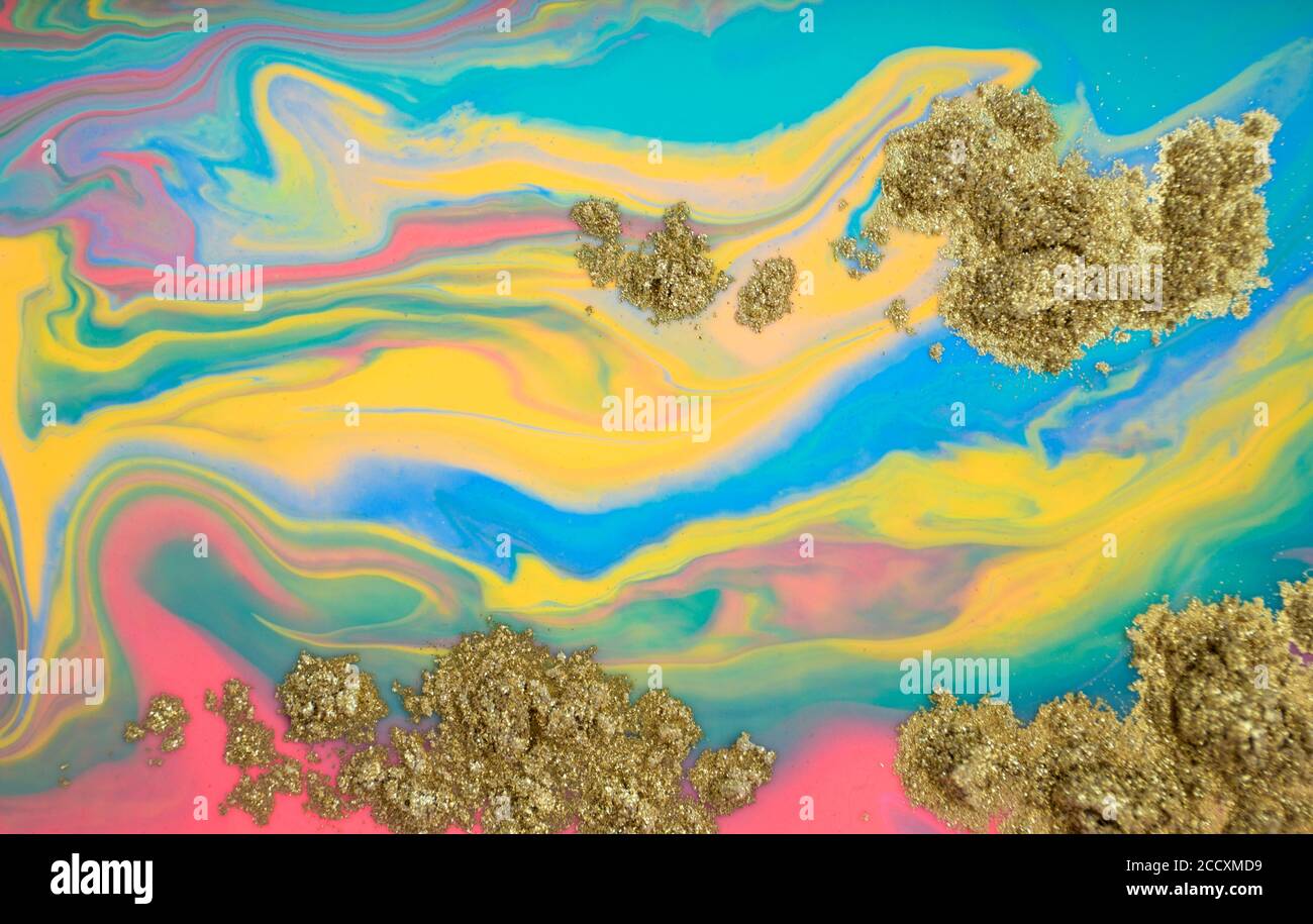 Colorful bright abstract marble pattern with golden powder scattering ...