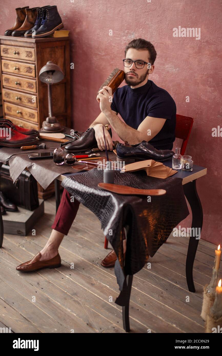 serious guy making up future plans. full length photo Stock Photo - Alamy