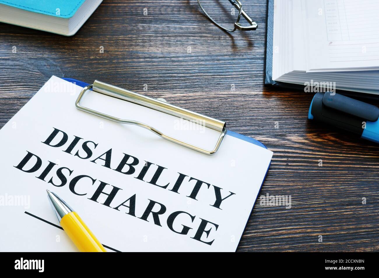 Disability discharge application papers and pen Stock Photo - Alamy