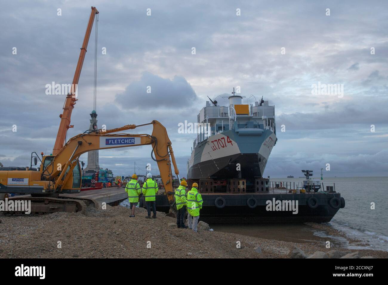 Portsmouth, Hampshire, UK. 24th Aug 2020. Workers prepare the LCT 7074 ...