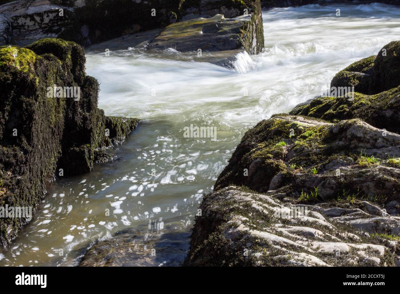 Rapids and water falls on a fast moving river Stock Photo - Alamy