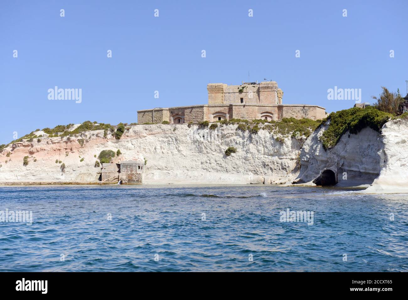 St. Lucian's Tower at Triq Il-Qajjenza, Birżebbuġa, Malta Stock Photo ...
