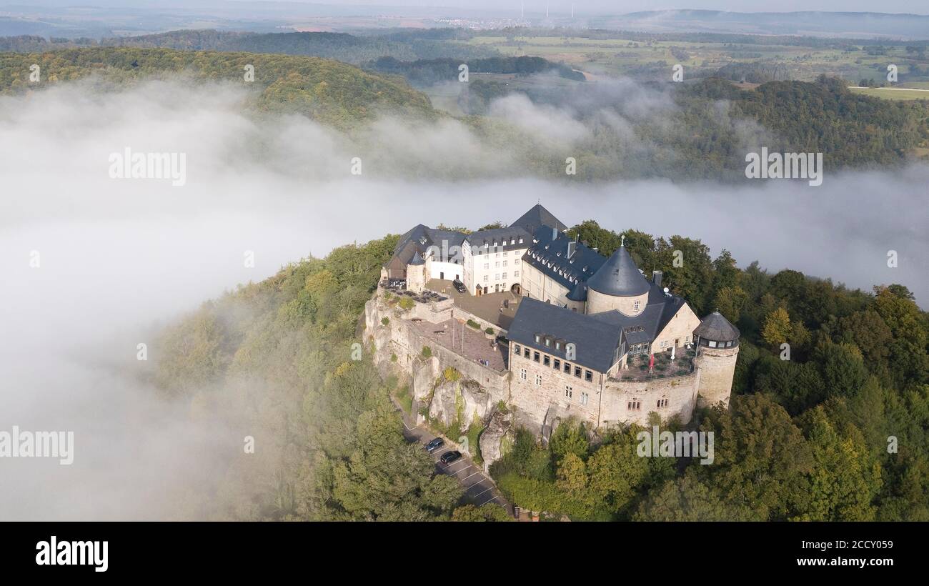 Bird's eye view, Waldeck Castle surrounded by clouds, Waldeck, Hesse ...