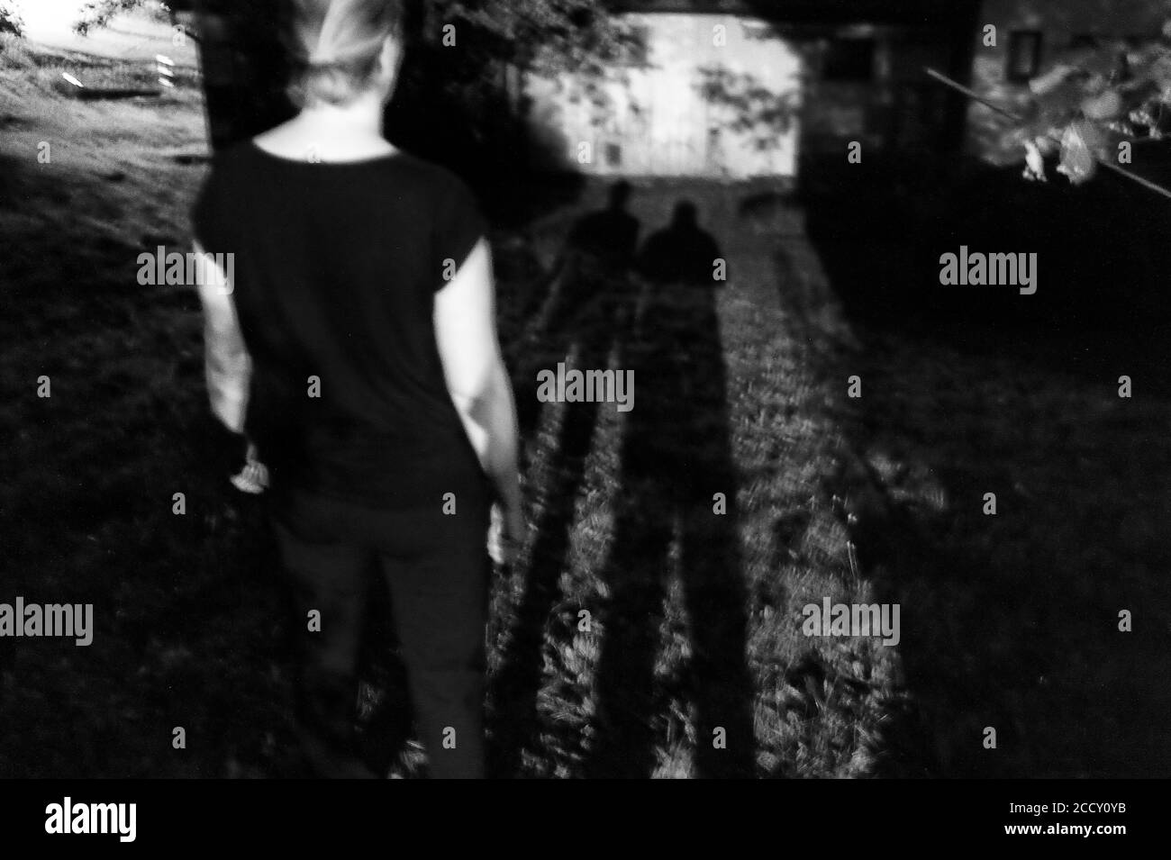 Woman with two black shadows, horror scene, crime scene, Germany Stock ...