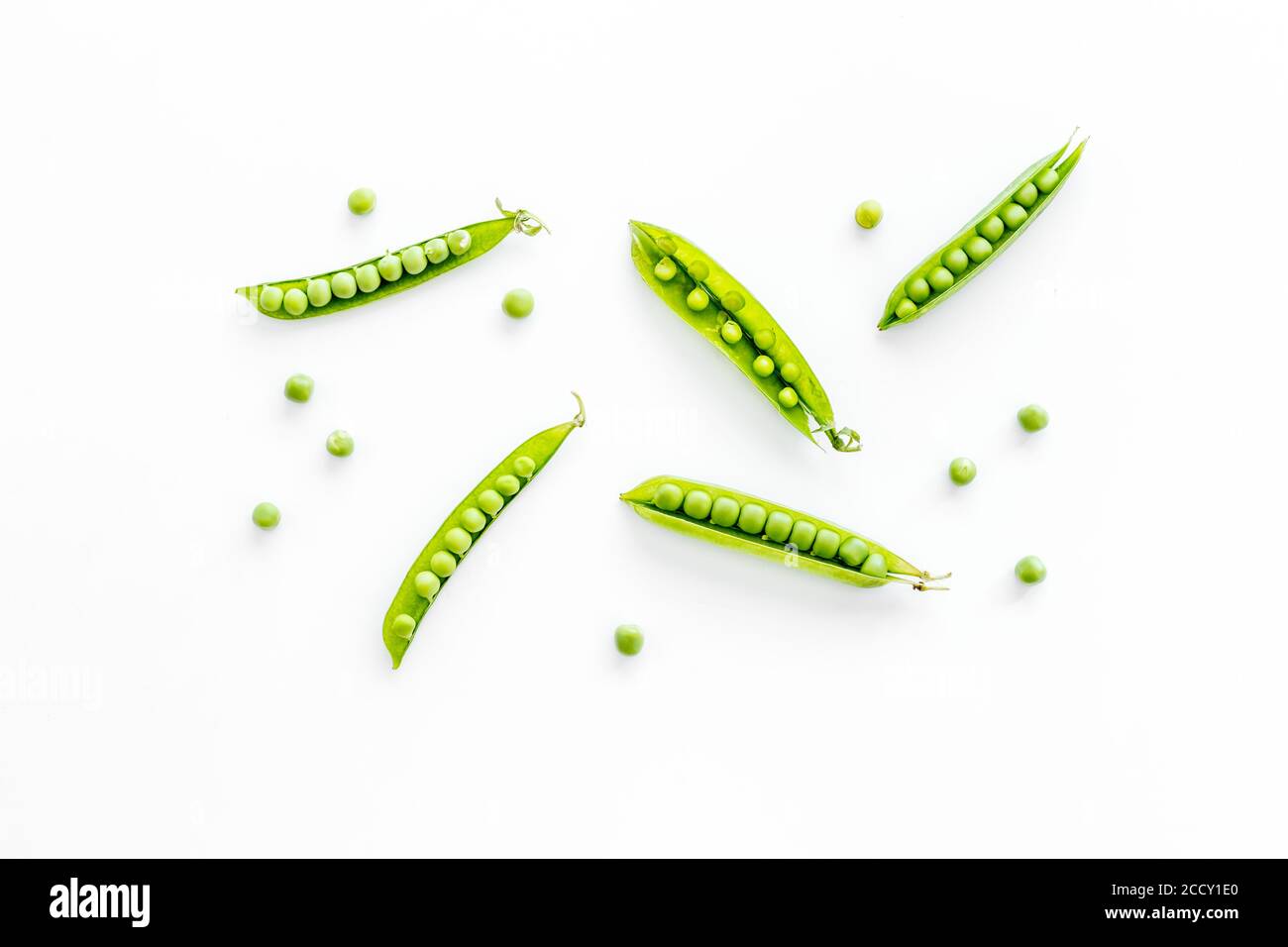 Set of green pea pods isolated on white background Stock Photo - Alamy